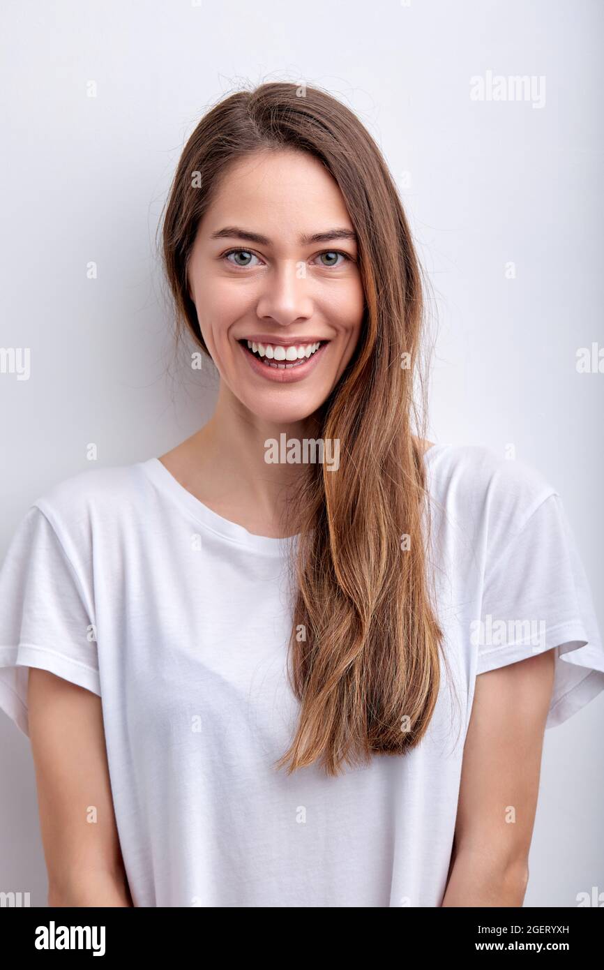 Positive cheerful Female In Casual Outfit Looking At camera smiling ...