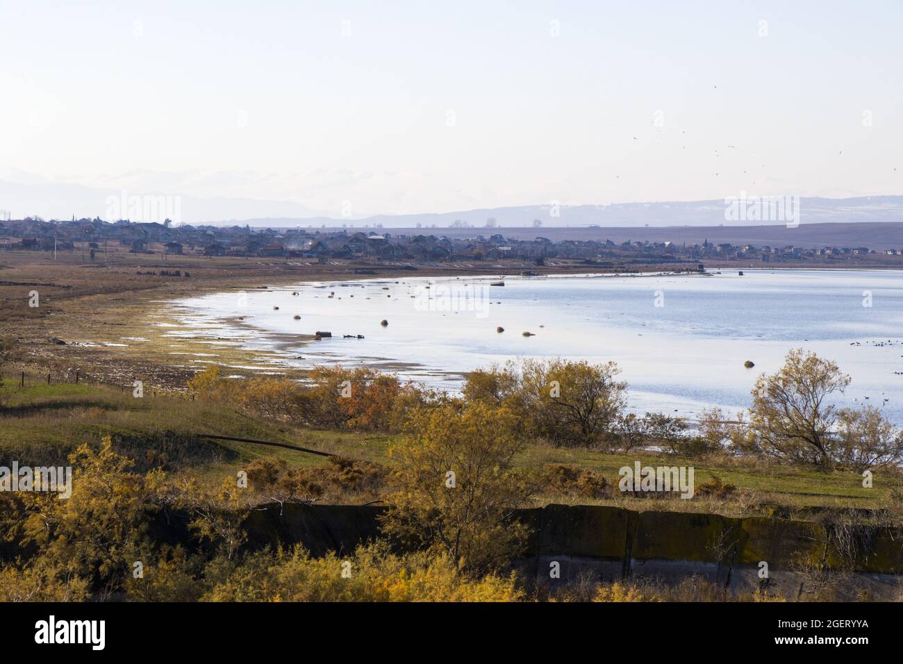 Beautiful scenery of a vast landscape and view of a calm lake in ...