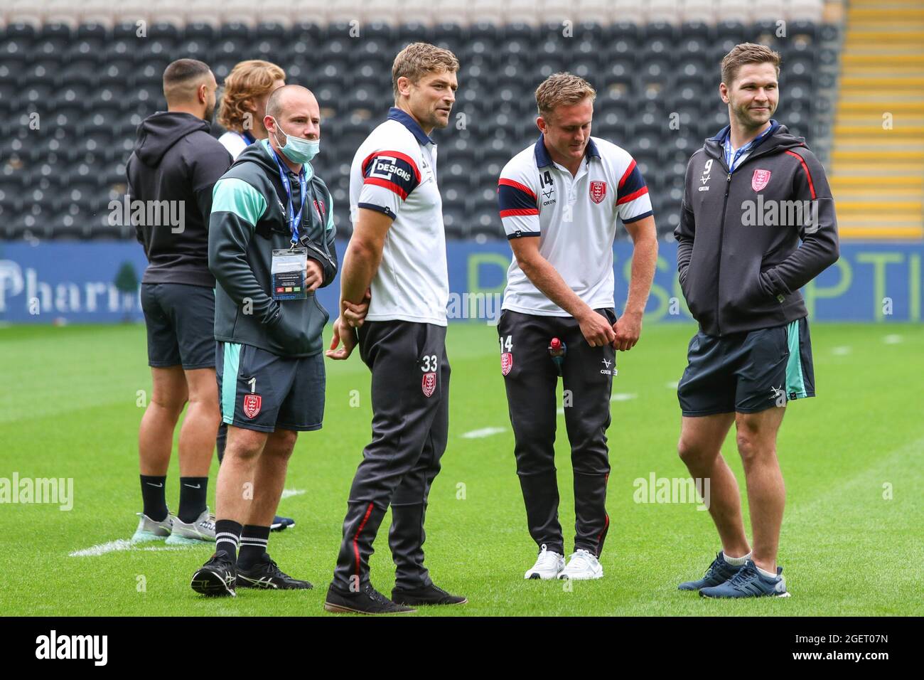 Hull KR players inspect the pitch prior to the kick off Stock Photo - Alamy