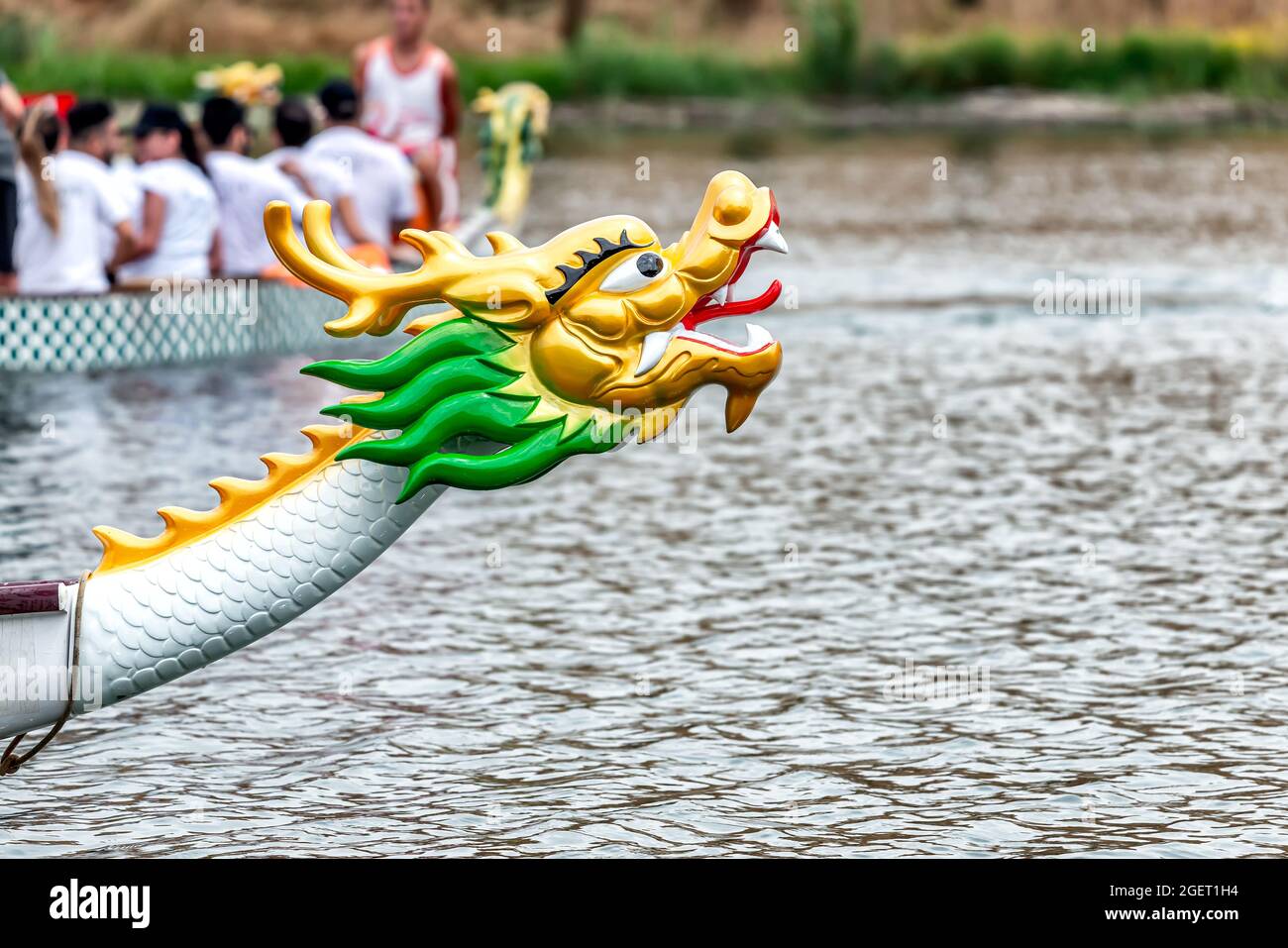 Dragon boat competition. Close-up of a boat's head Stock Photo - Alamy