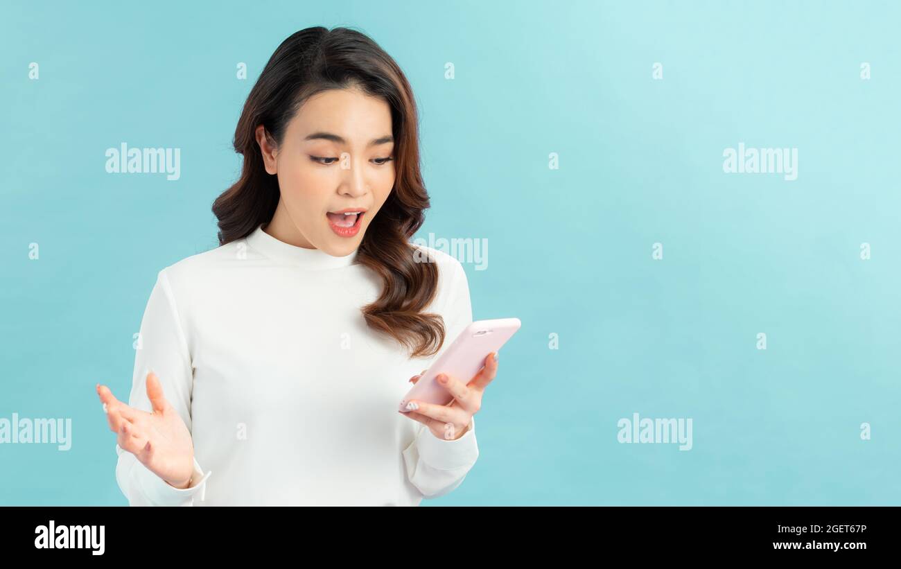 Image of a beautiful amazing excited happy woman posing isolated over ...