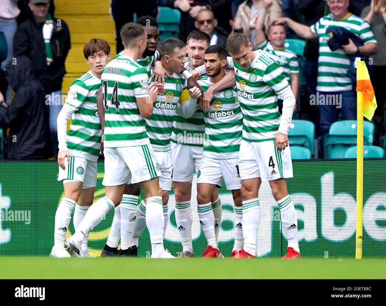 Celtic's Liel Abada celebrates with his team-mates after scoring their ...