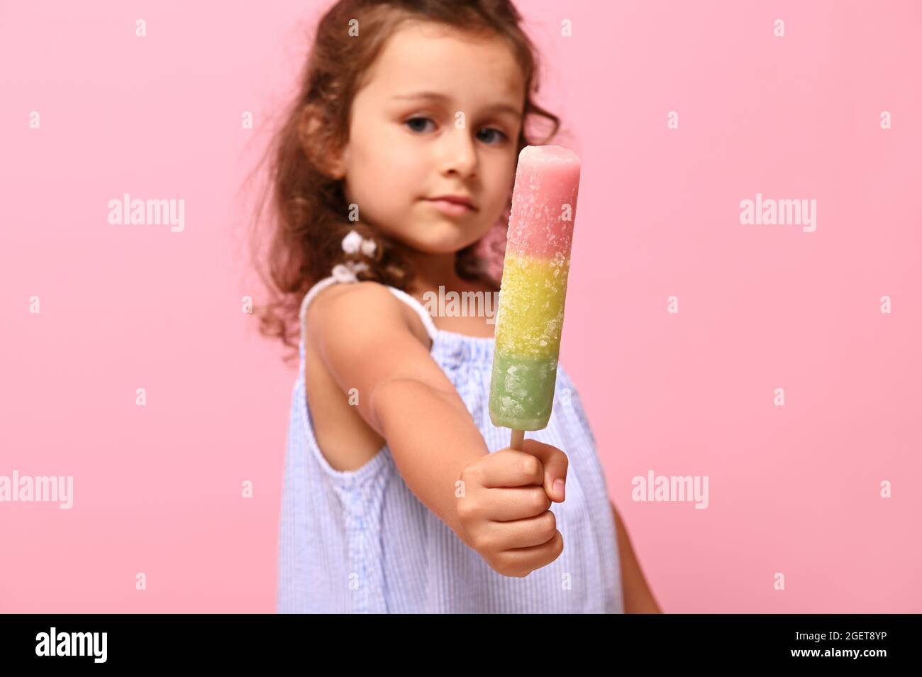 Girl eating popsicle ice cream hi-res stock photography and images - Alamy