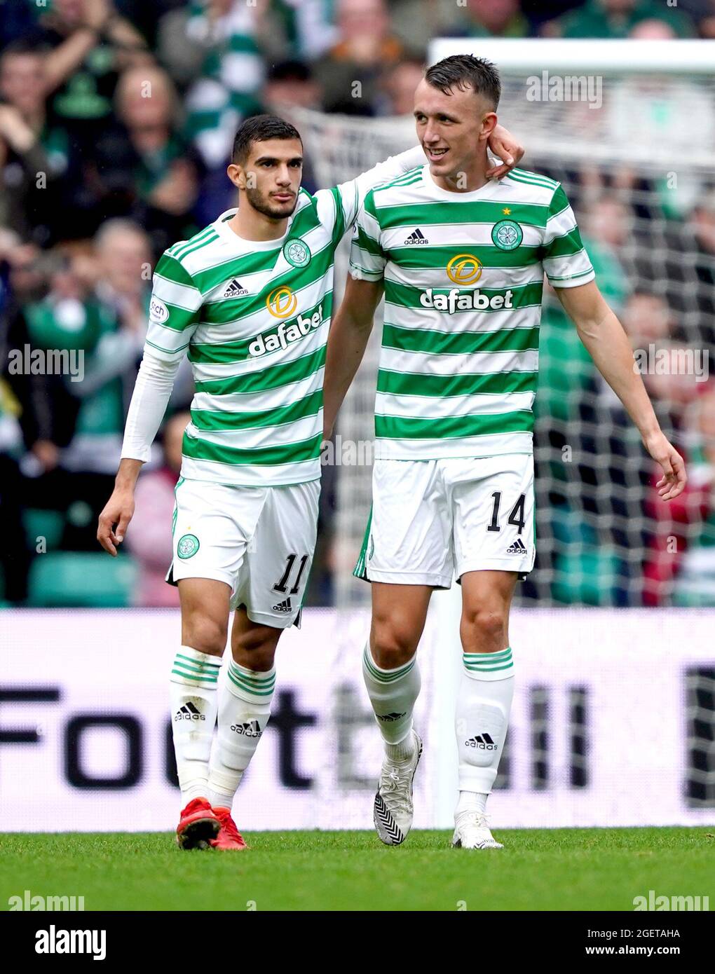 Celtic's David Turnbull (right) celebrates with team-mate Liel Abada ...