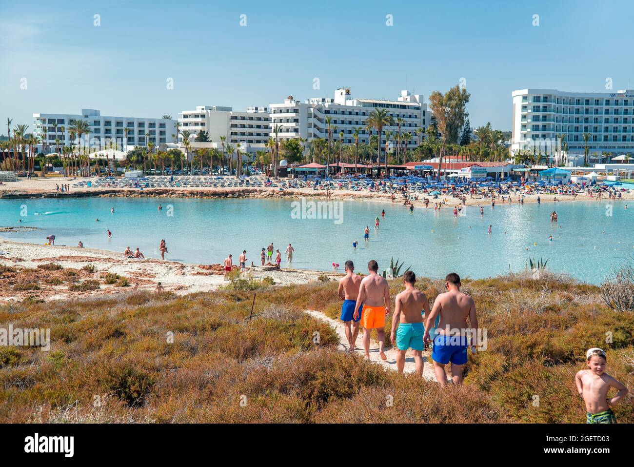AGIA NAPA, CYPRUS - April 3, 2016: Tourists on famous blue flagged ...