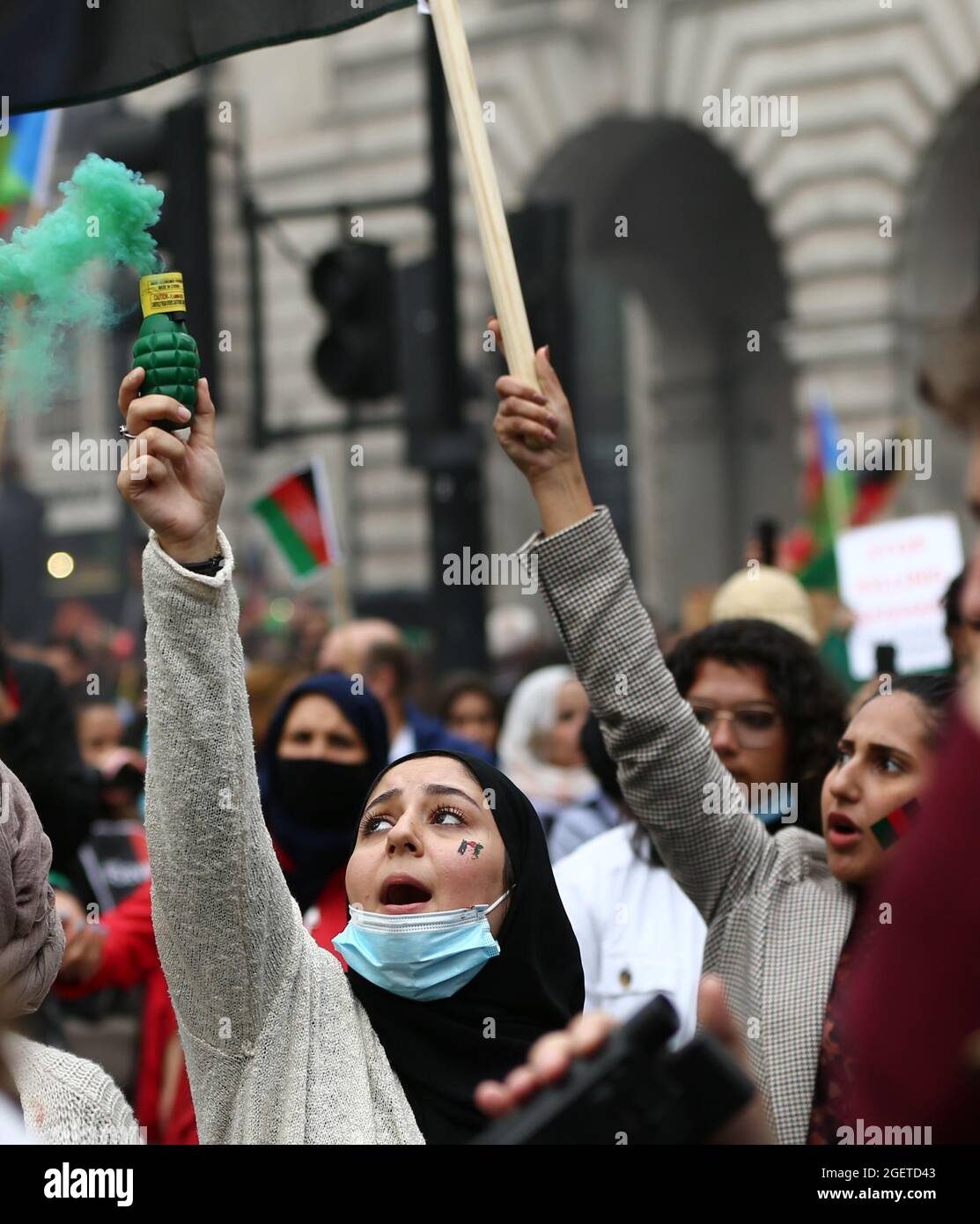 London, England, UK. 21st Aug, 2021. Thousands of Afghans march through ...