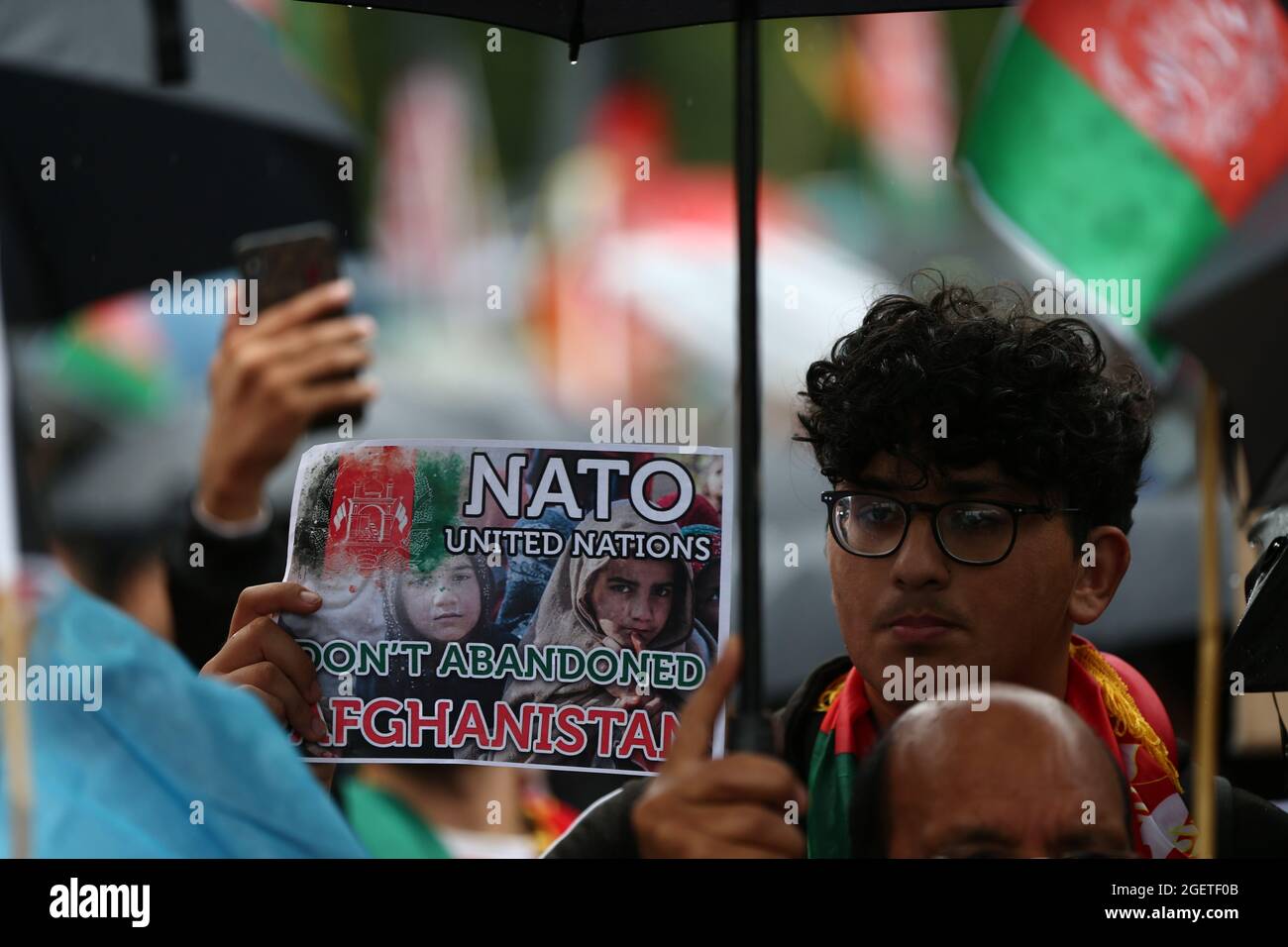London, England, UK. 21st Aug, 2021. Thousands of Afghans march through ...