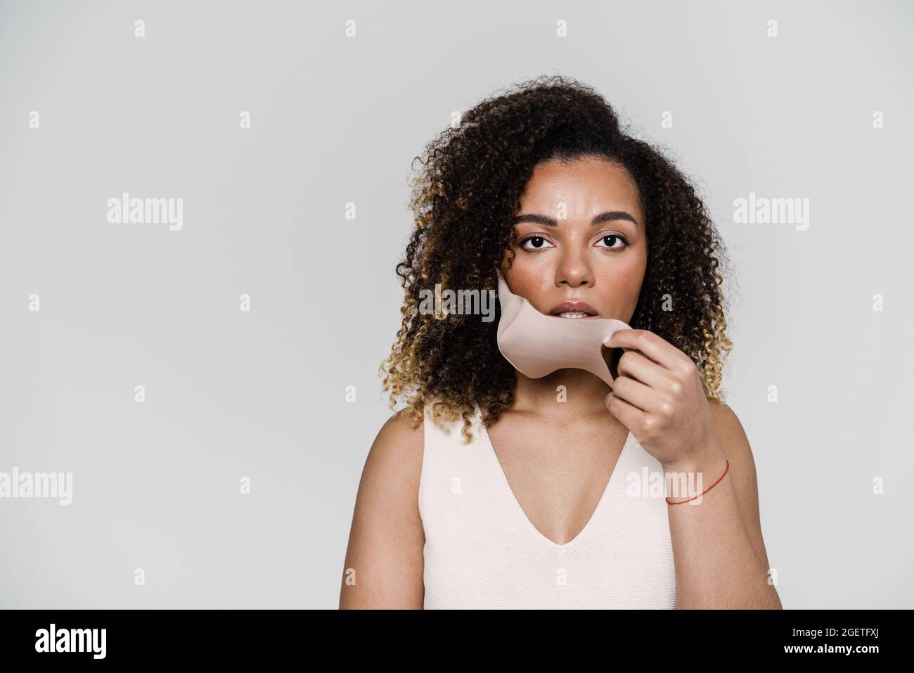 Putting on reusable face hi-res stock photography and images - Alamy