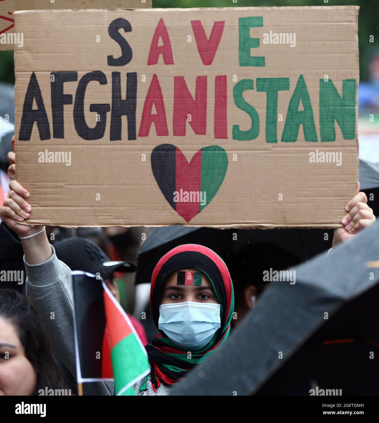 London, England, UK. 21st Aug, 2021. Thousands of Afghans march through ...