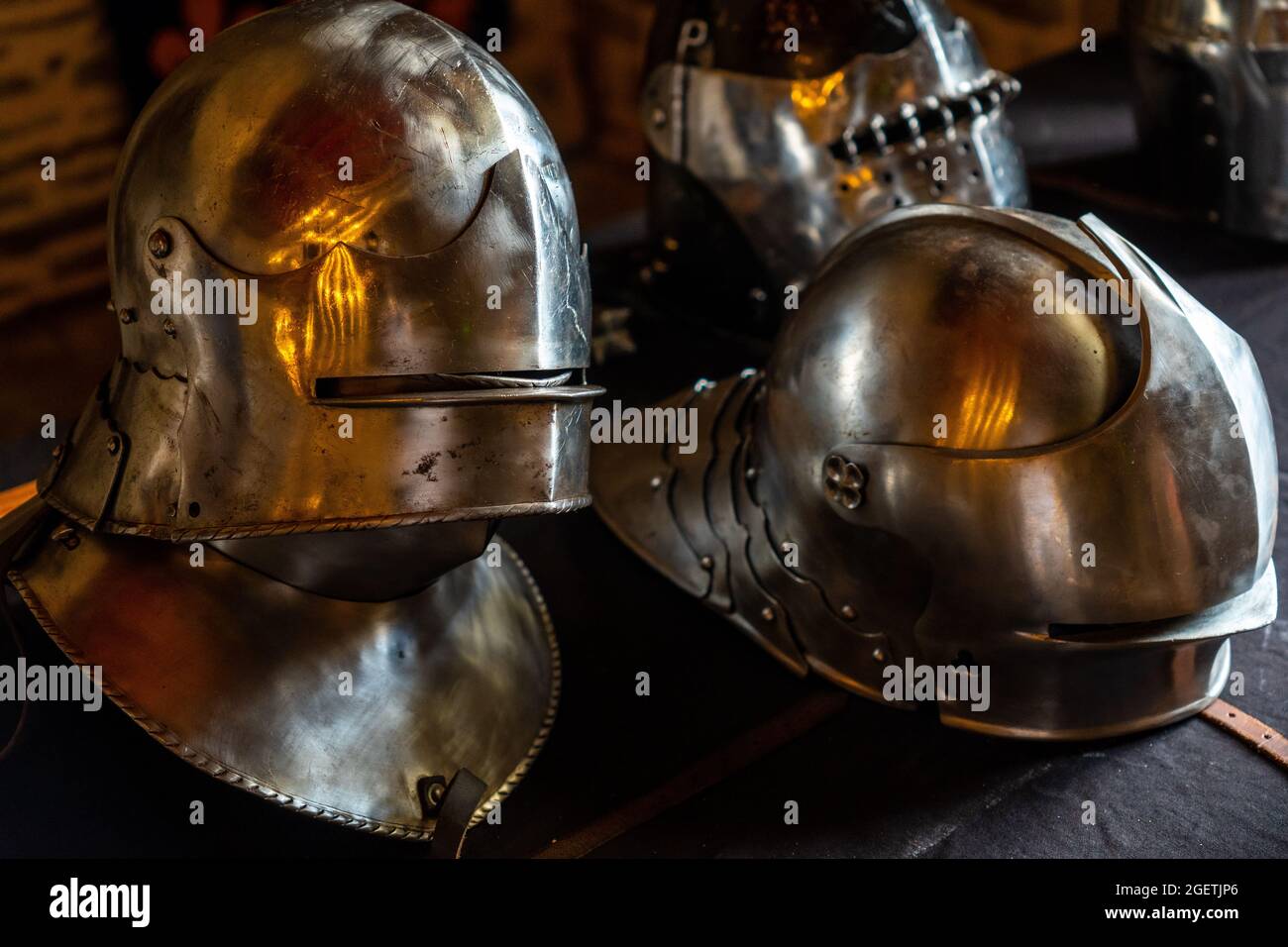 Close-up shot of medieval knight armor helmets in the castle of ...