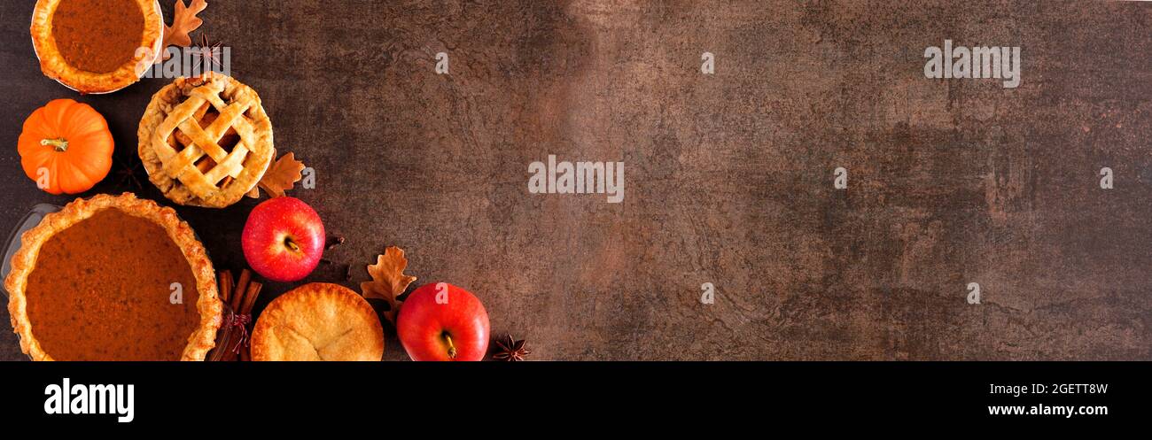 Variety of homemade autumn pies. Pumpkin, apple and pecan. Above view ...