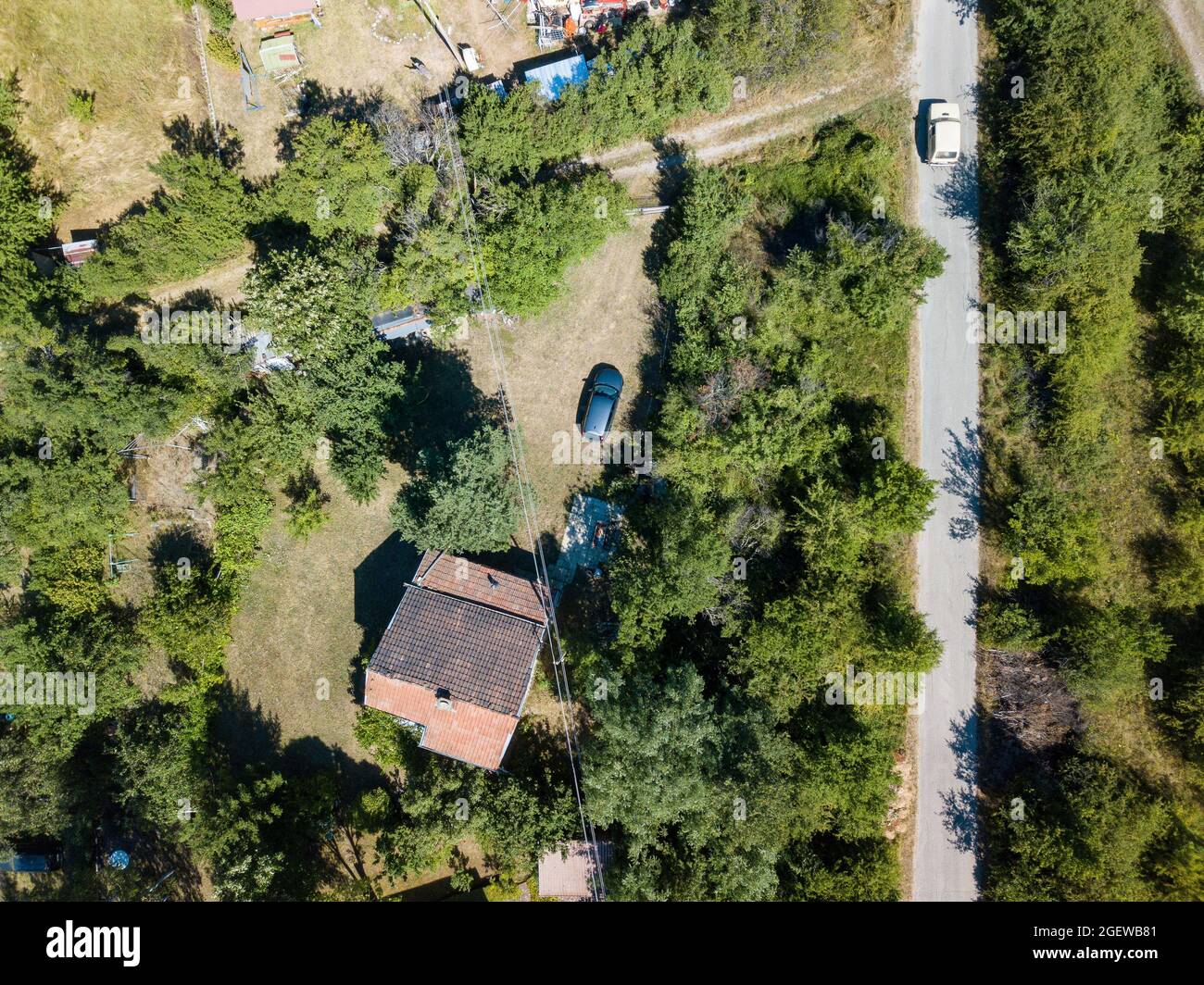 Top view of a landscape covered in lush nature and roads Stock Photo ...
