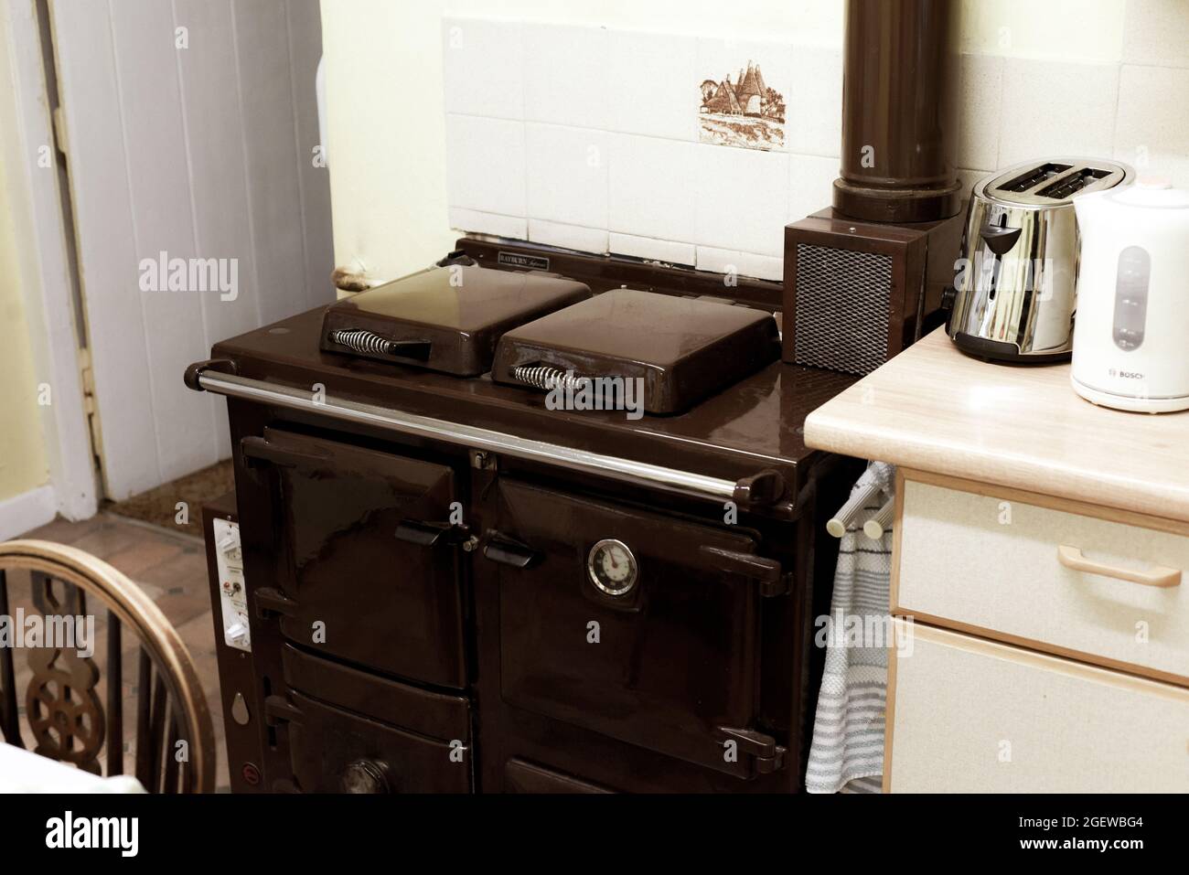 Old style oil burning stove in retro kitchen interior Stock Photo - Alamy