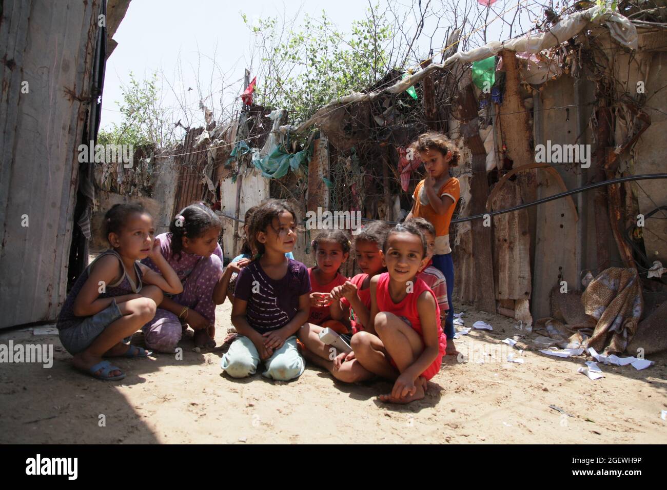 Children playing near homes hi-res stock photography and images - Alamy