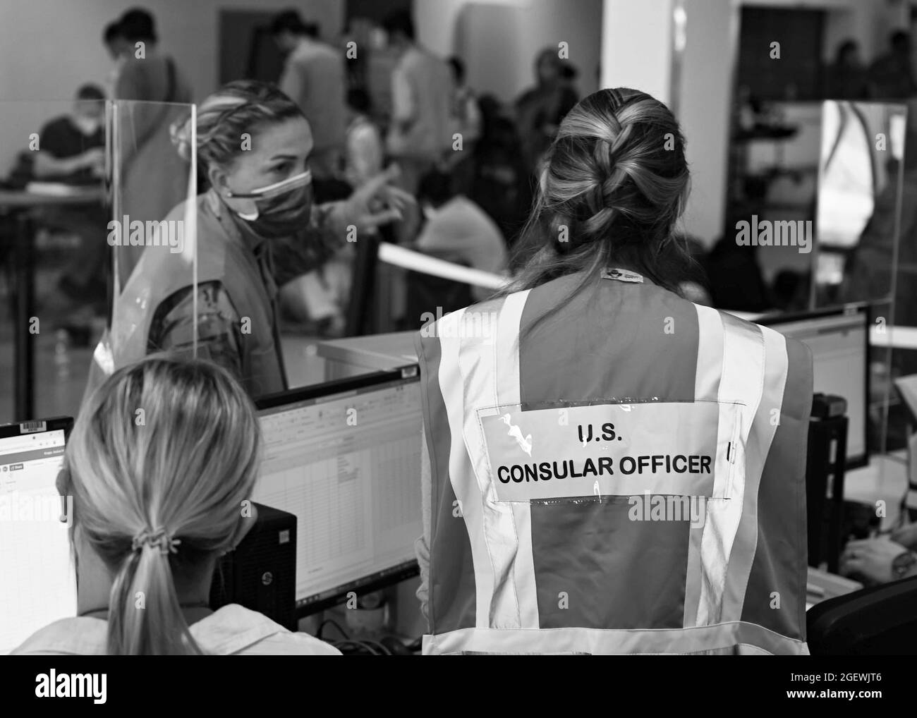 U.S. foreign service officers tend to Afghan evacuees at Ramstein Air ...