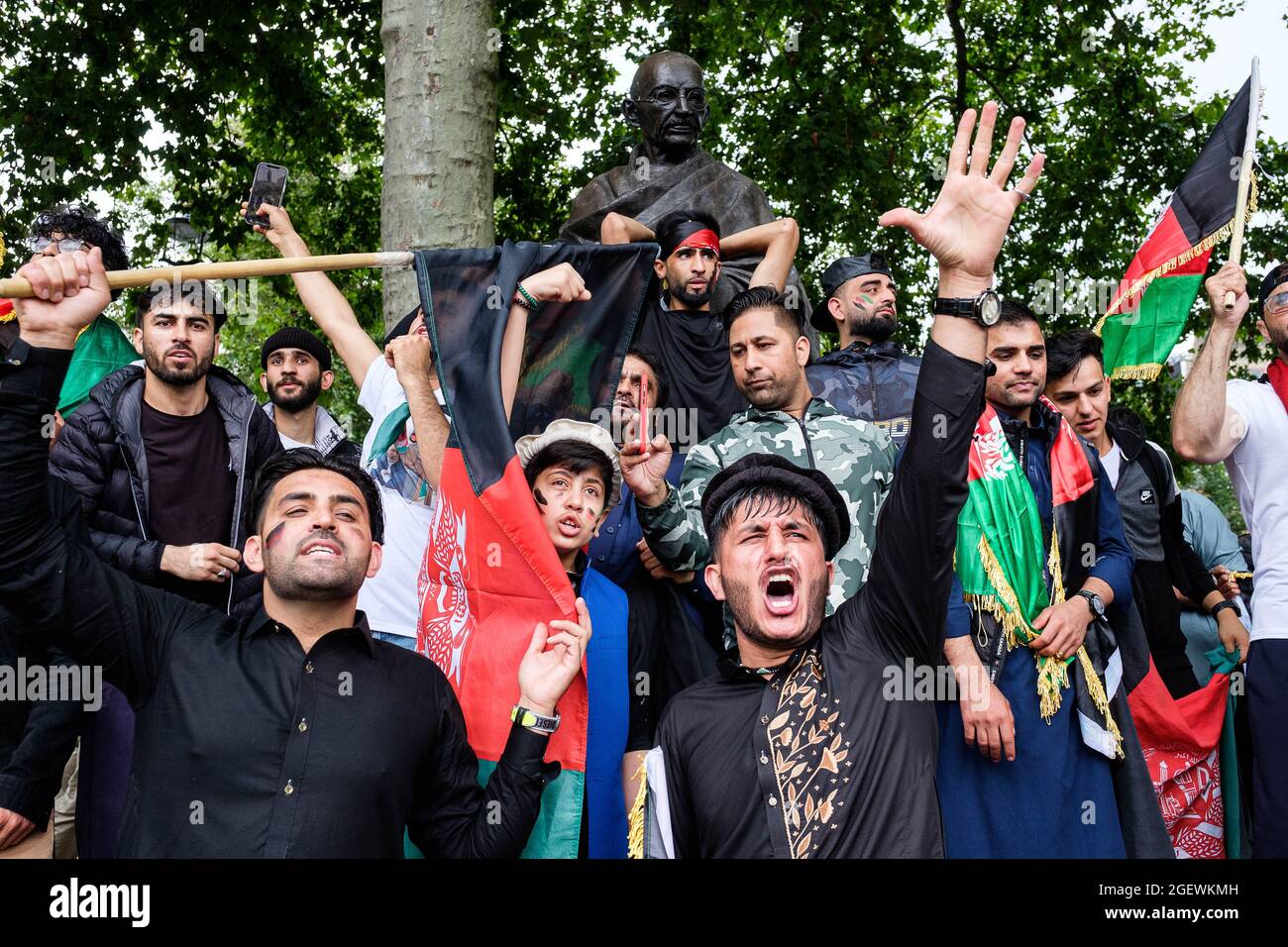 London, UK. 21st Aug, 2021. The Afghan community in London marched from ...