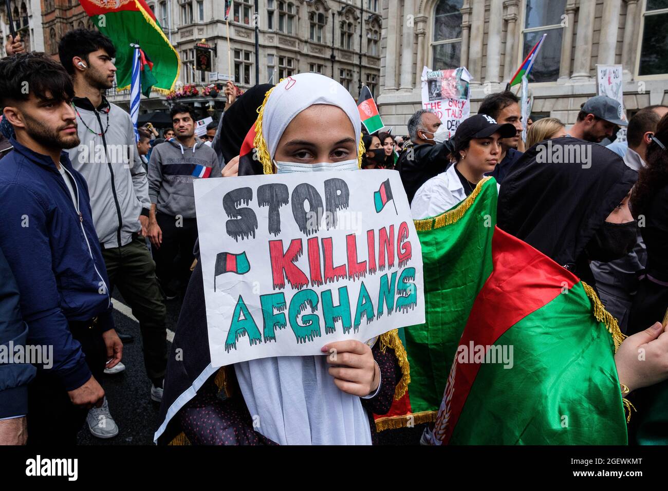 London, UK. 21st Aug, 2021. The Afghan community in London marched from ...