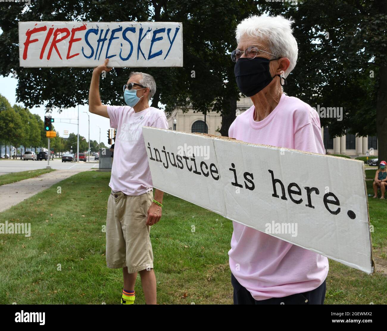 Kenosha, Wisconsin, USA. 21st Aug, 2021. BILL GREGORY, left, holds a ...