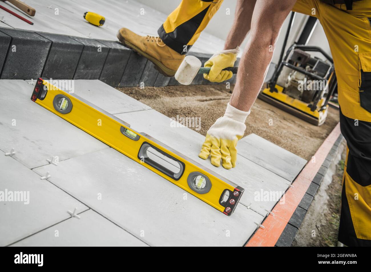 Caucasian Construction Worker with Professional Hammer in His Hand ...