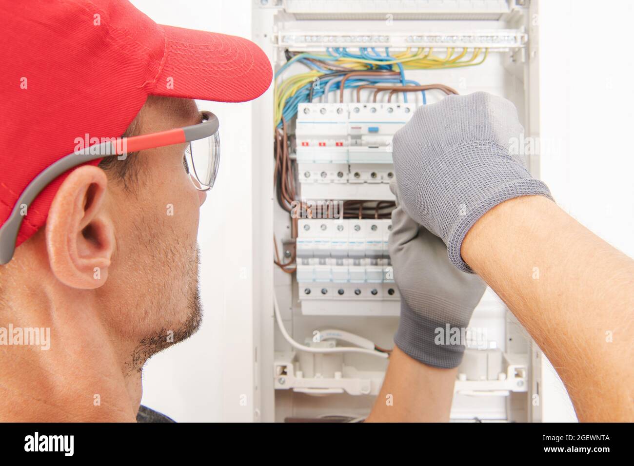 Apartment Fusebox Installation by Caucasian Electrician in His 40s ...
