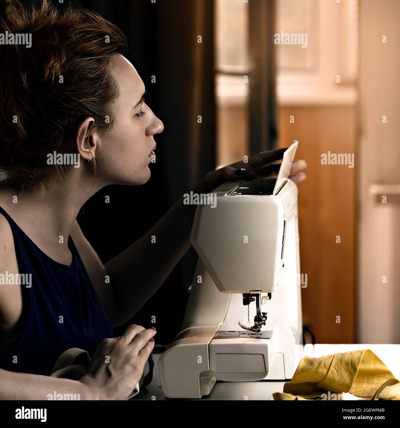 tailor lady creates new types of clothing. design and sewing business ...