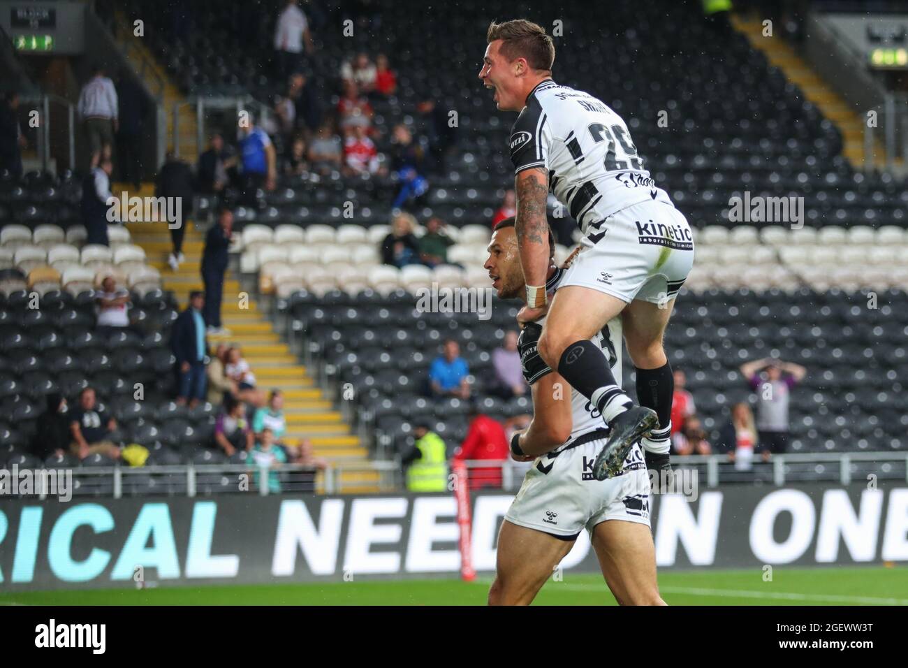Jamie Shaul (29) of Hull FC celebrates Carlos Tuimavave (3) of Hull FC ...