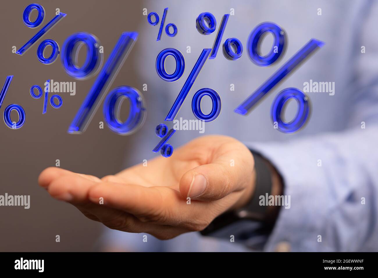 Digital concept of sales with floating percent signs on a hand Stock ...