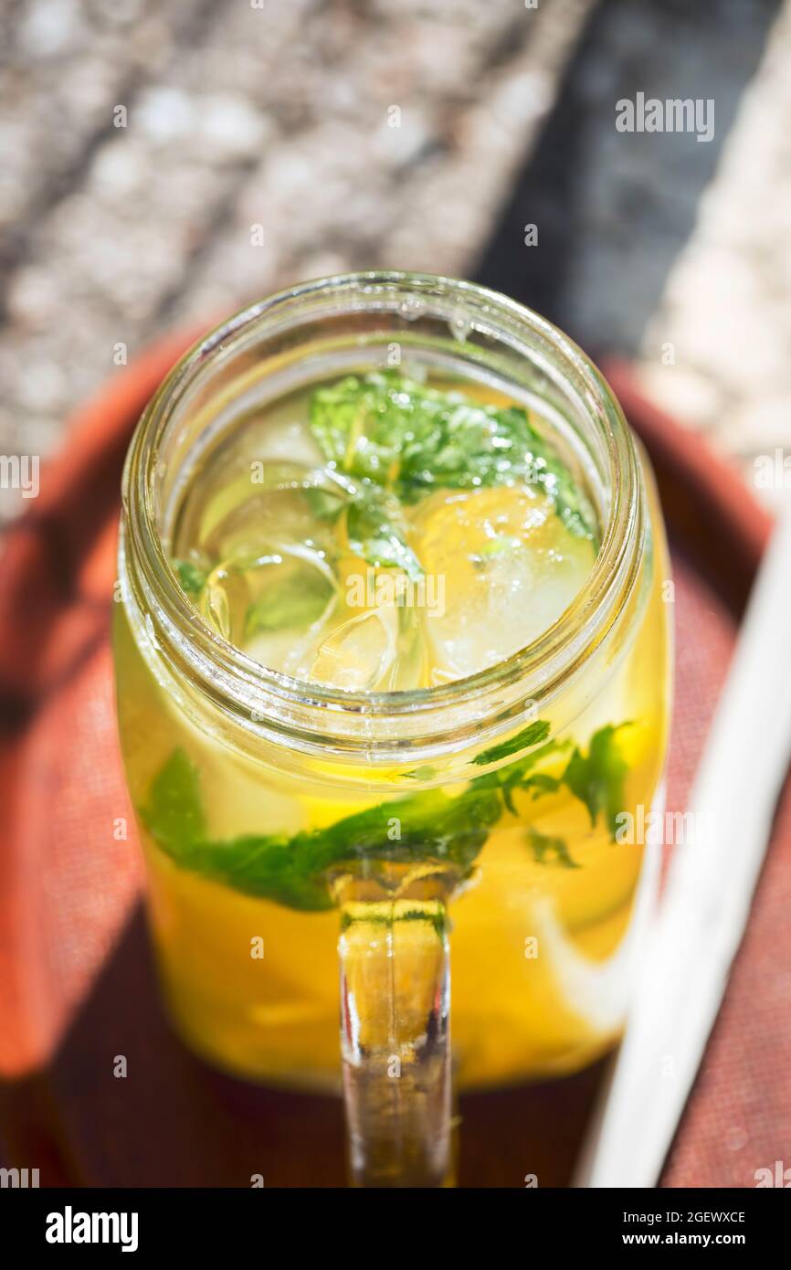 Summer fruit mint ice tea Stock Photo - Alamy