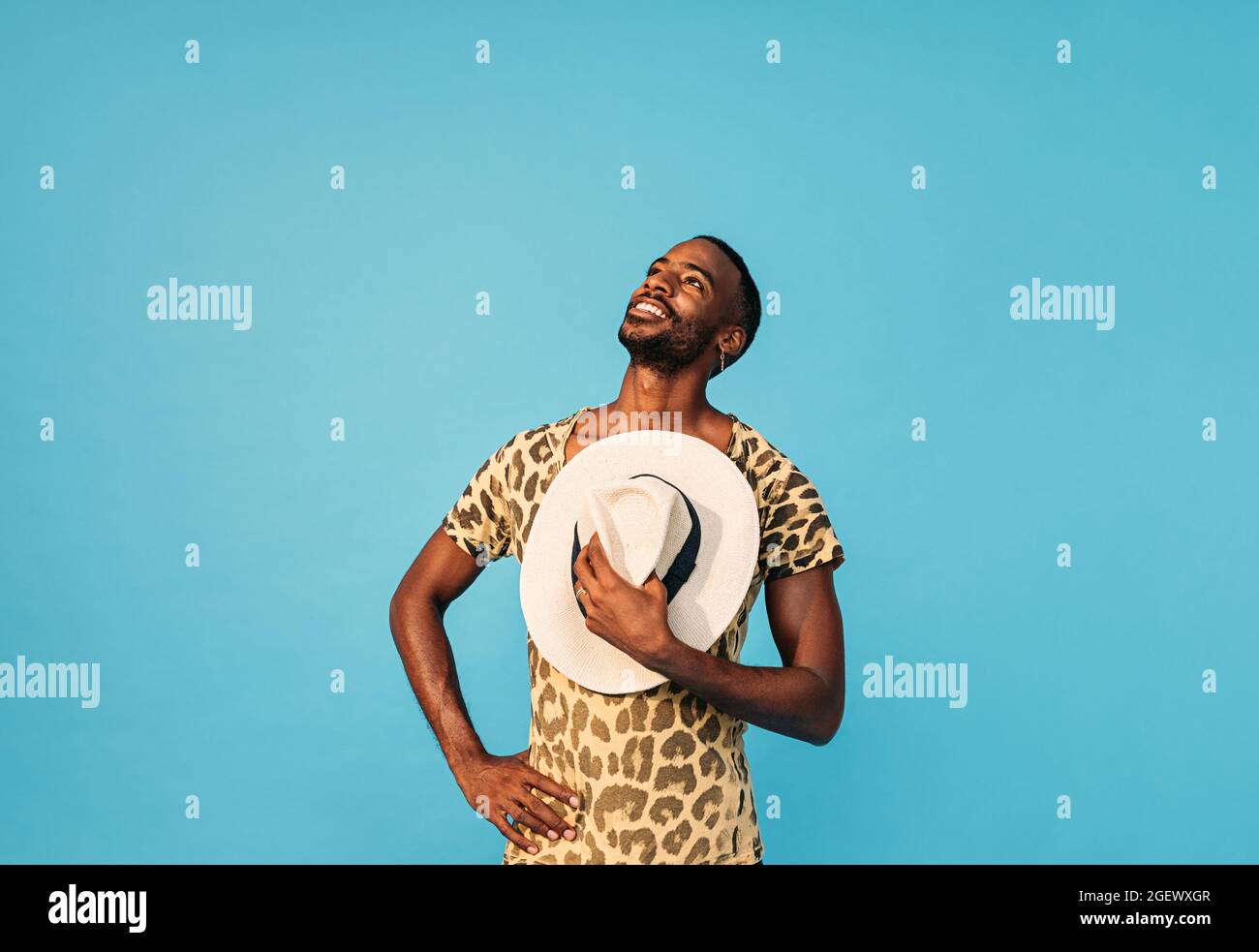 African american man holding chest hi-res stock photography and images ...