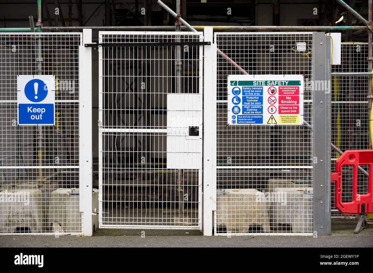 Access gate to construction site and health and safety message rules ...