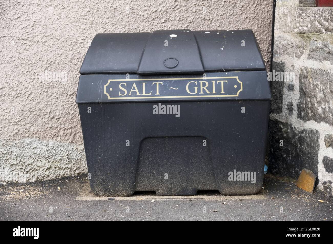 Salt grit black container for winter road safety on council road Stock ...