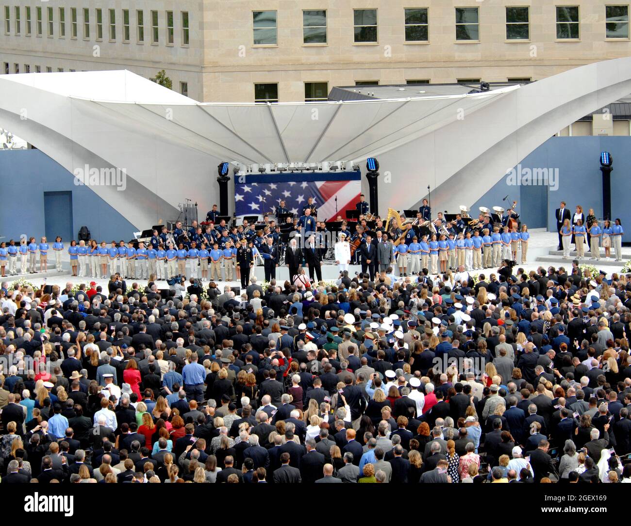 The official party and audience sing "God Bless America" at the ...