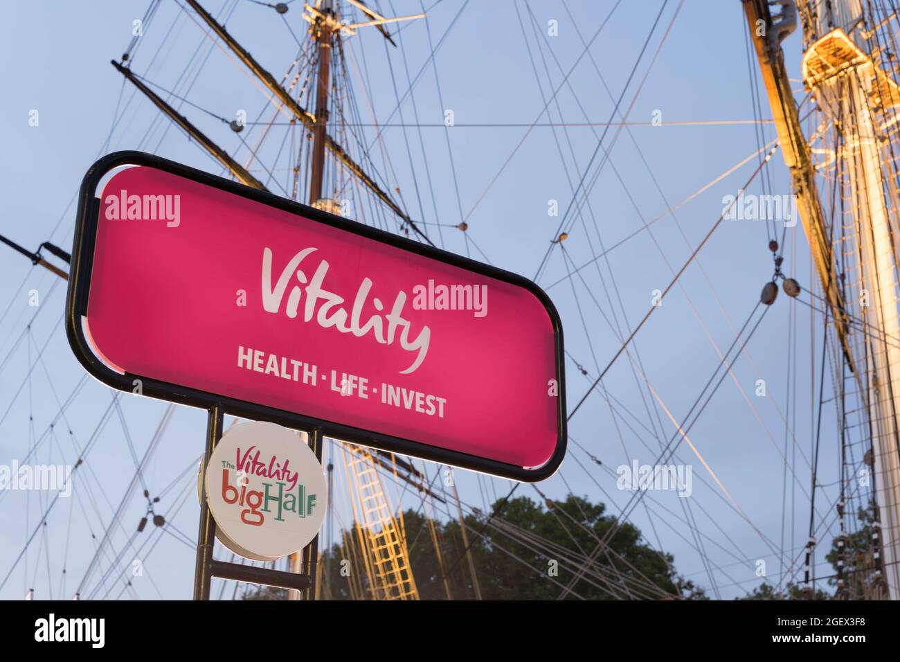Sponsor Vitality sign in pink background for big half marathon Stock ...