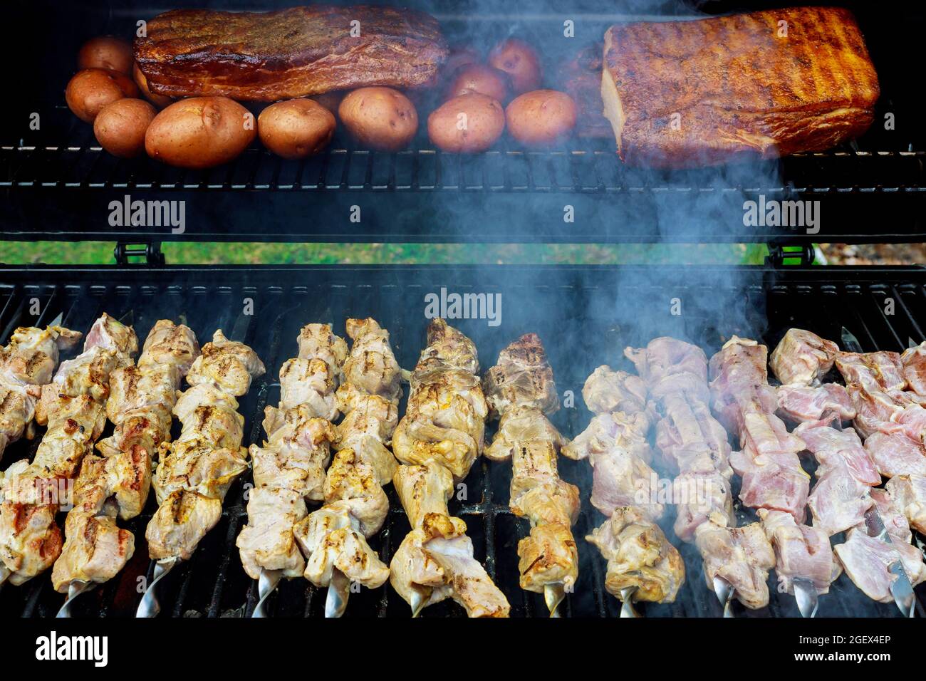 Process of frying a classic barbecue on charcoal in the skewer are ...