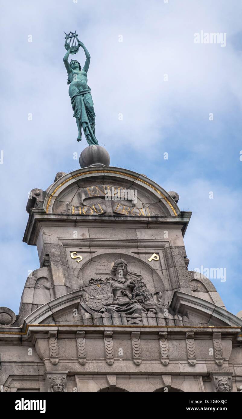 Gent, Flanders, Belgium - July 30, 2021: Green bronze statue on top of ...