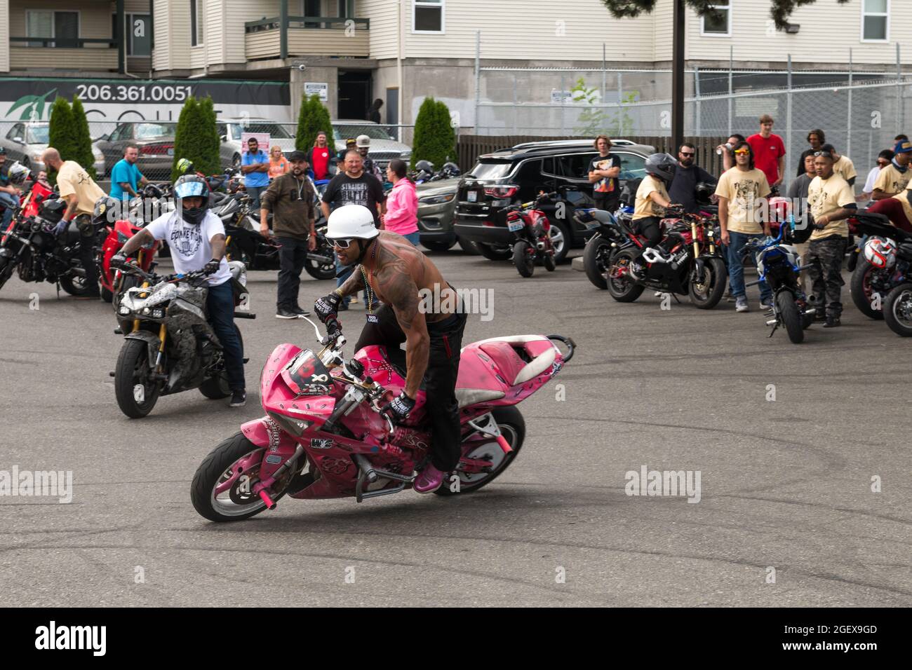 Seattle, USA. 21st Aug, 2021. Around 3:00pm a street bike flash mob takeover of Dicks Drive-In ...