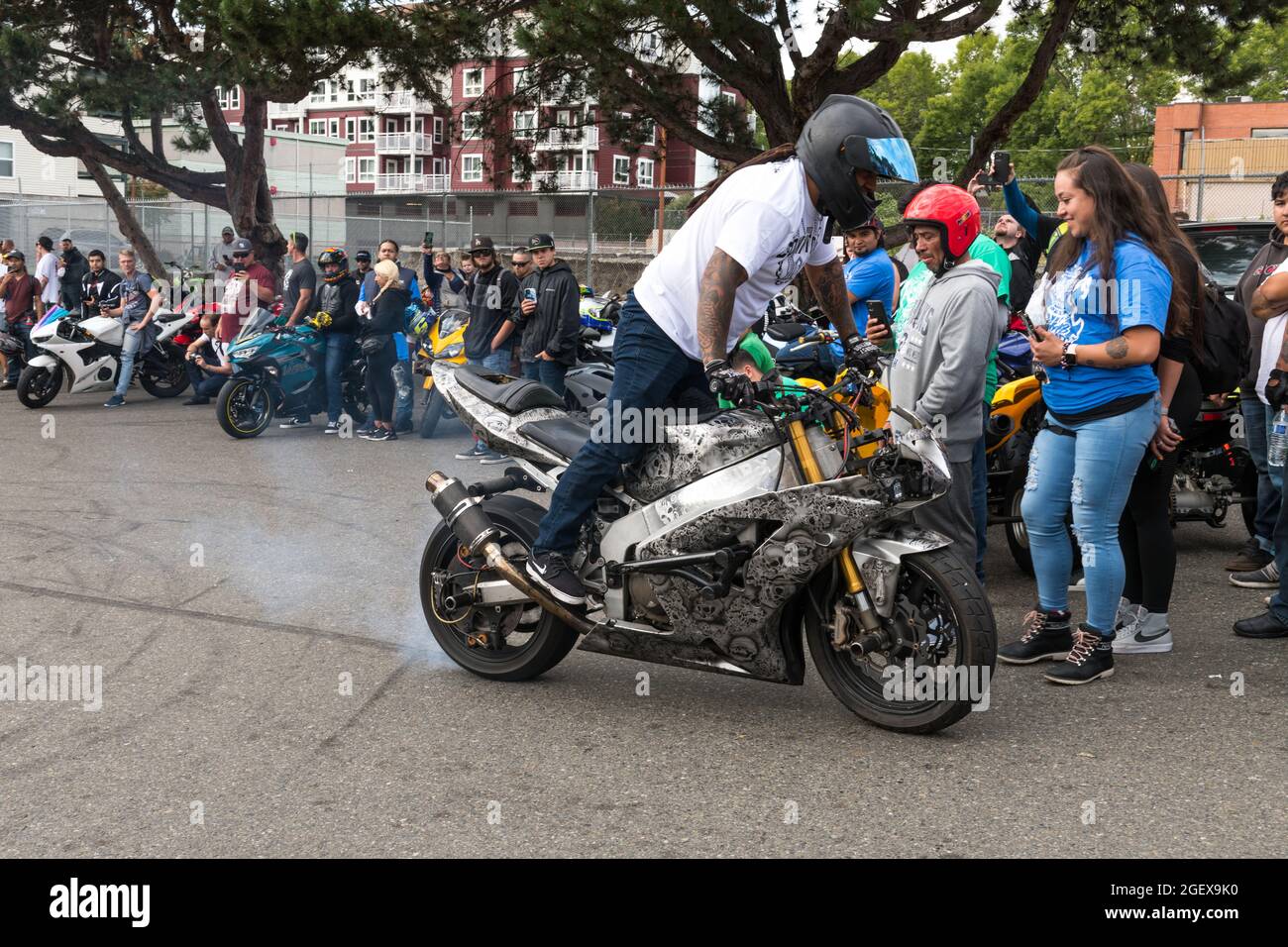 Seattle, USA. 21st Aug, 2021. Around 3:00pm a street bike flash mob takeover of Dicks Drive-In ...