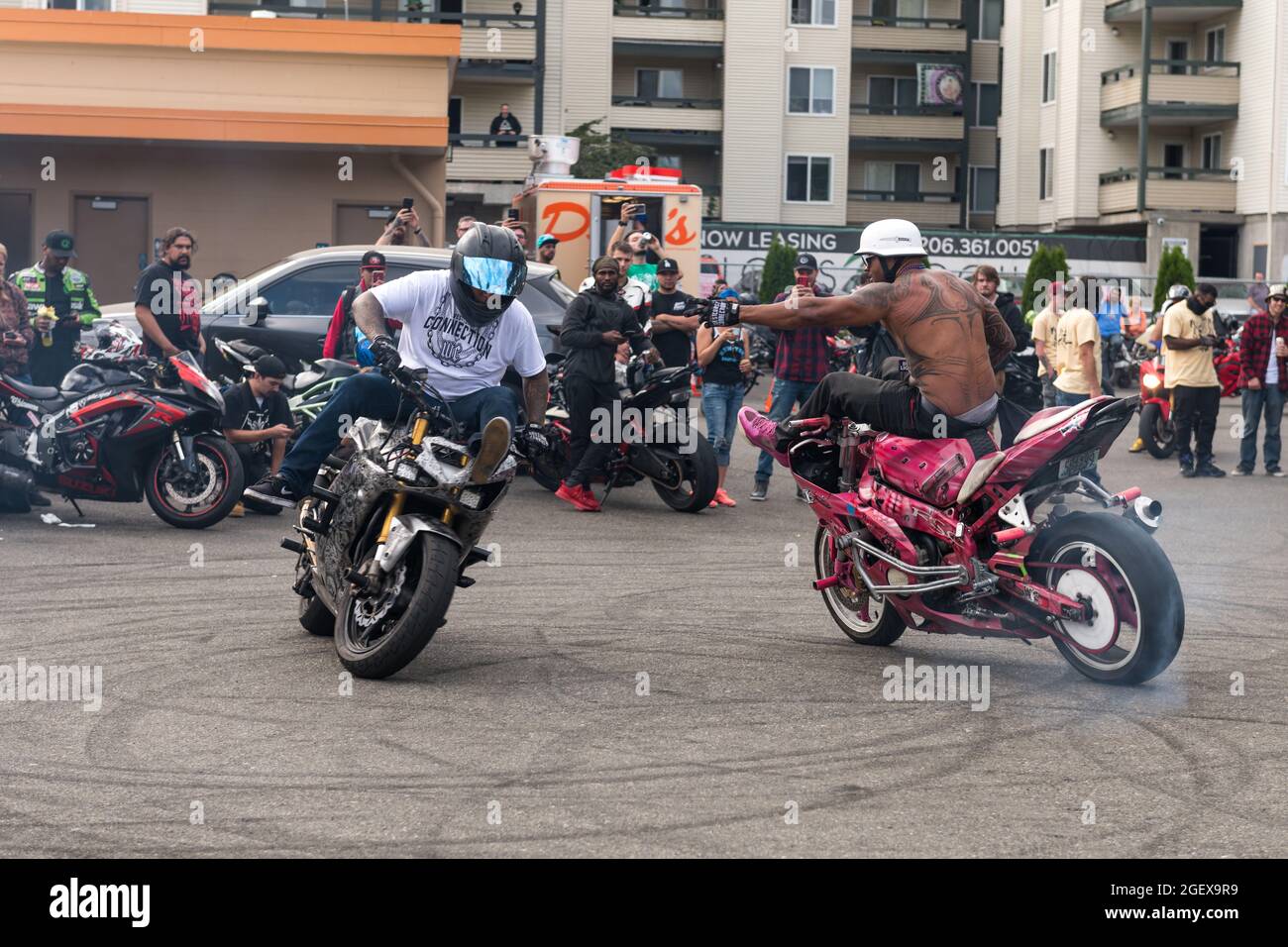 Seattle, USA. 21st Aug, 2021. Around 3:00pm a street bike flash mob takeover of Dicks Drive-In ...