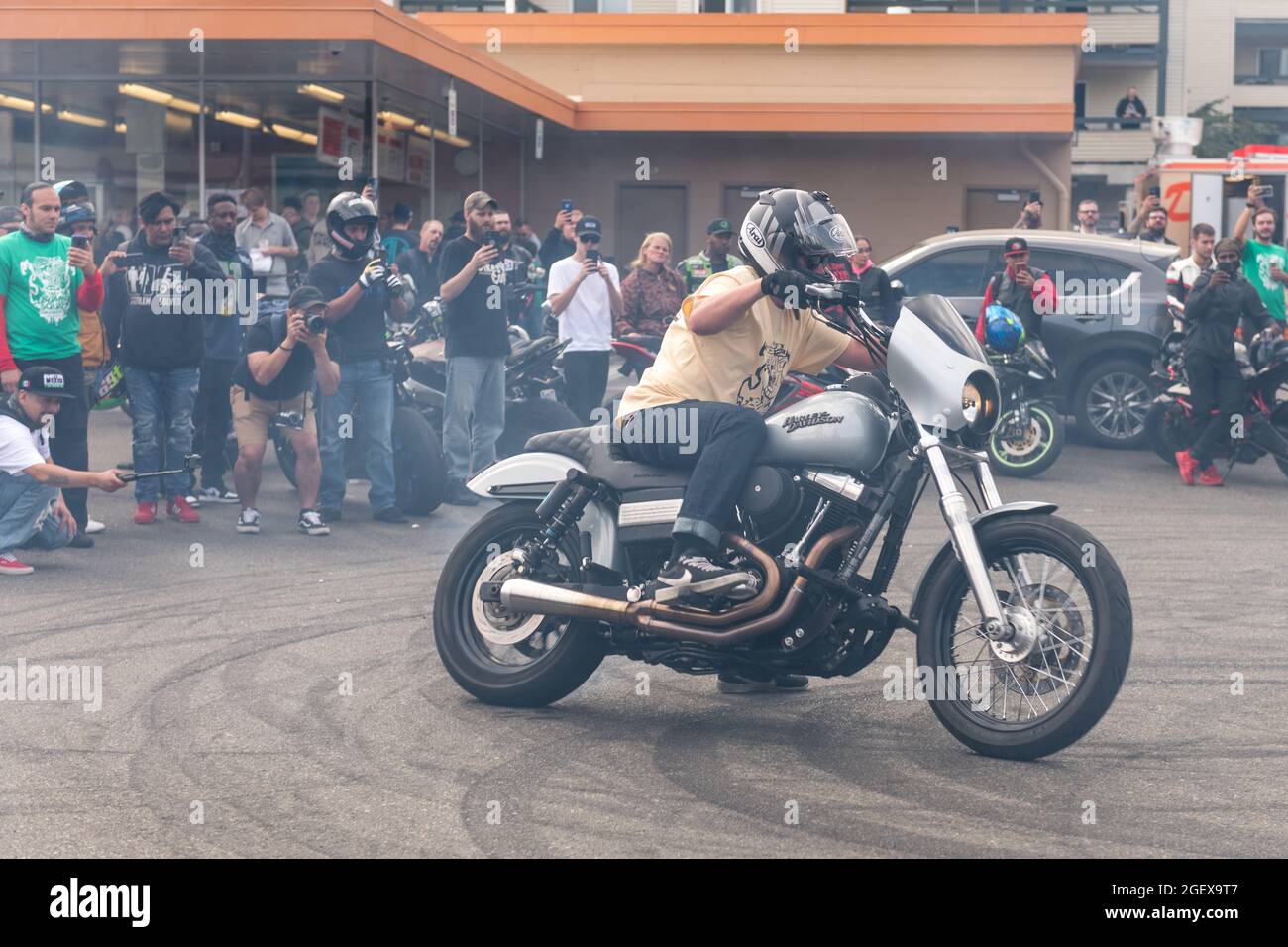 Seattle, USA. 21st Aug, 2021. Around 3:00pm a street bike flash mob takeover of Dicks Drive-In ...