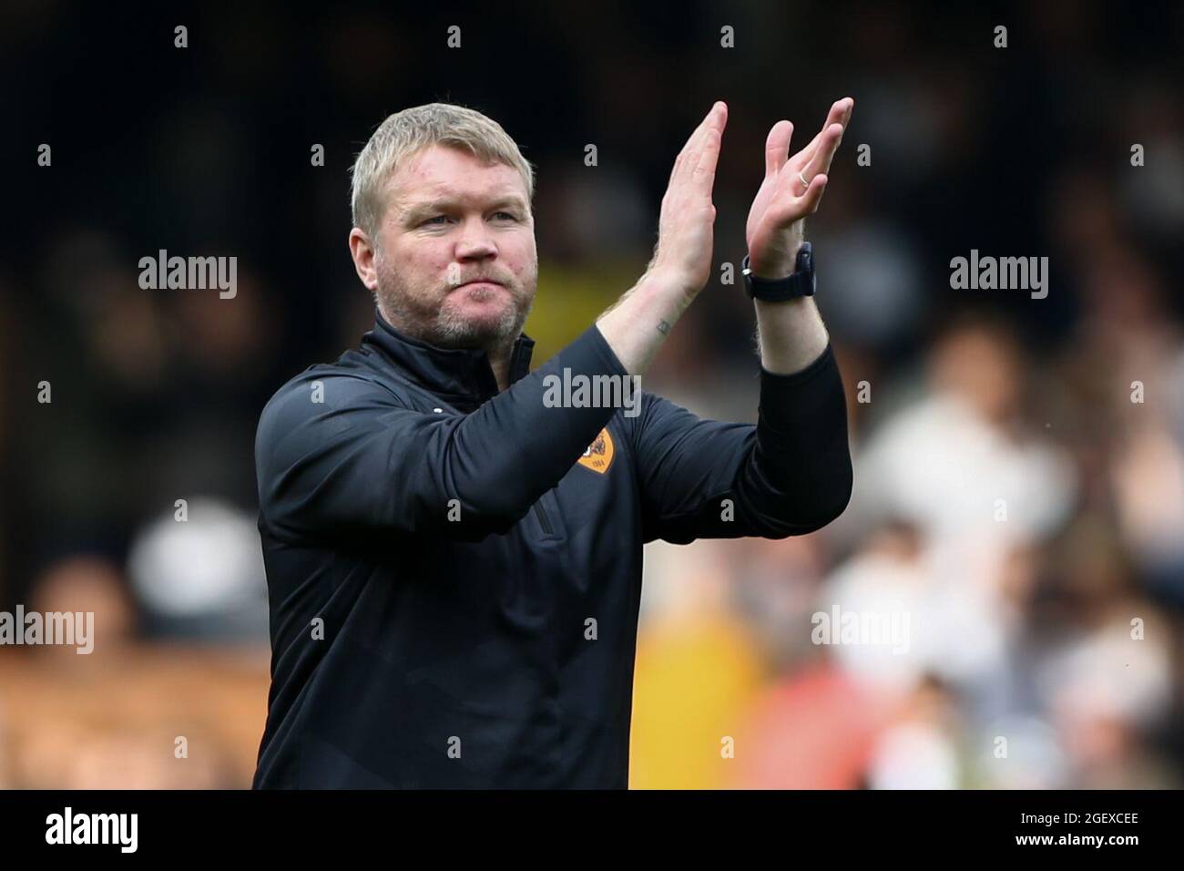 Grant McCann manager of Hull City applauds the travelling fans at the ...