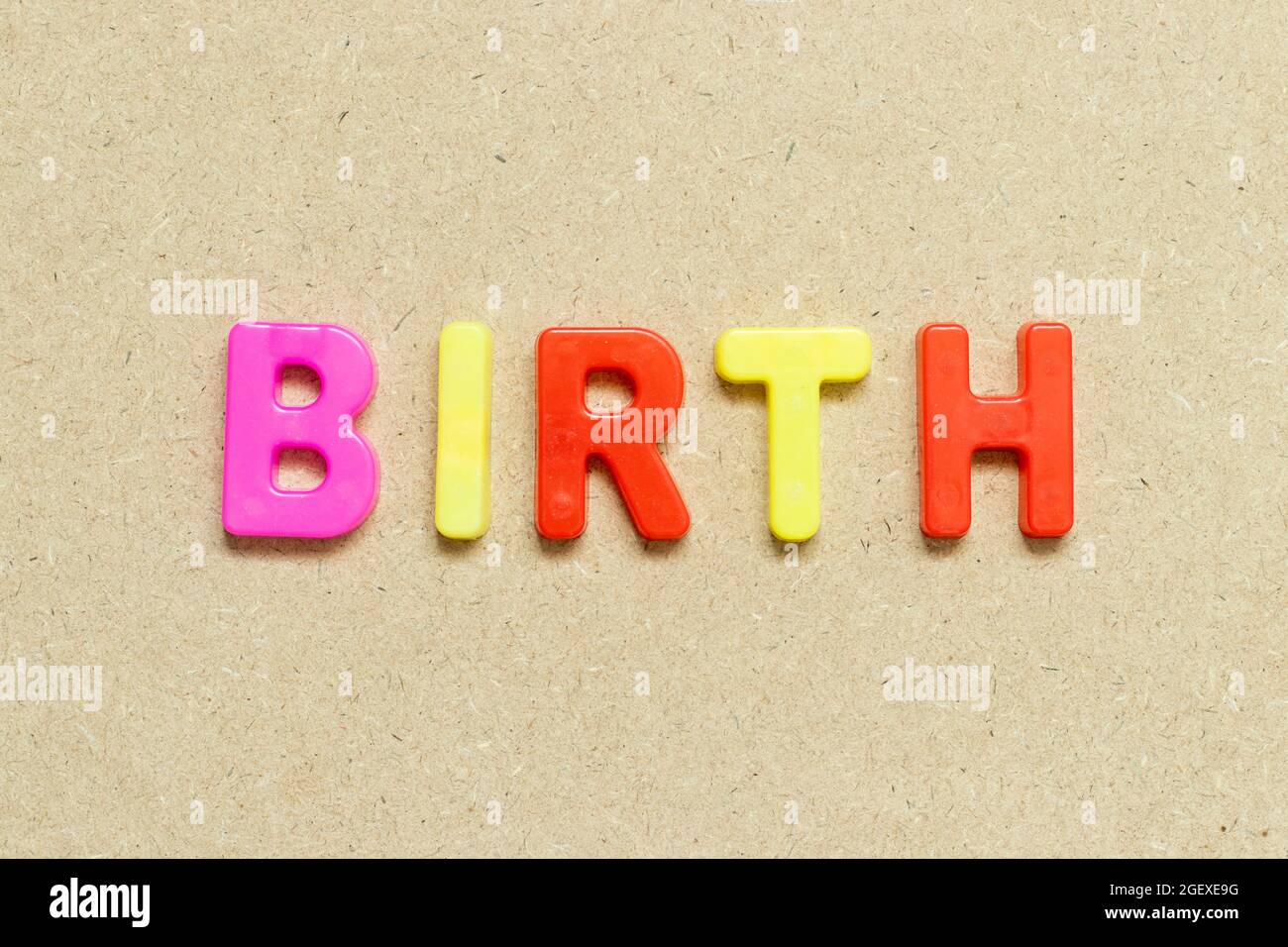 Color alphabet letter with word birth on wood background Stock Photo ...