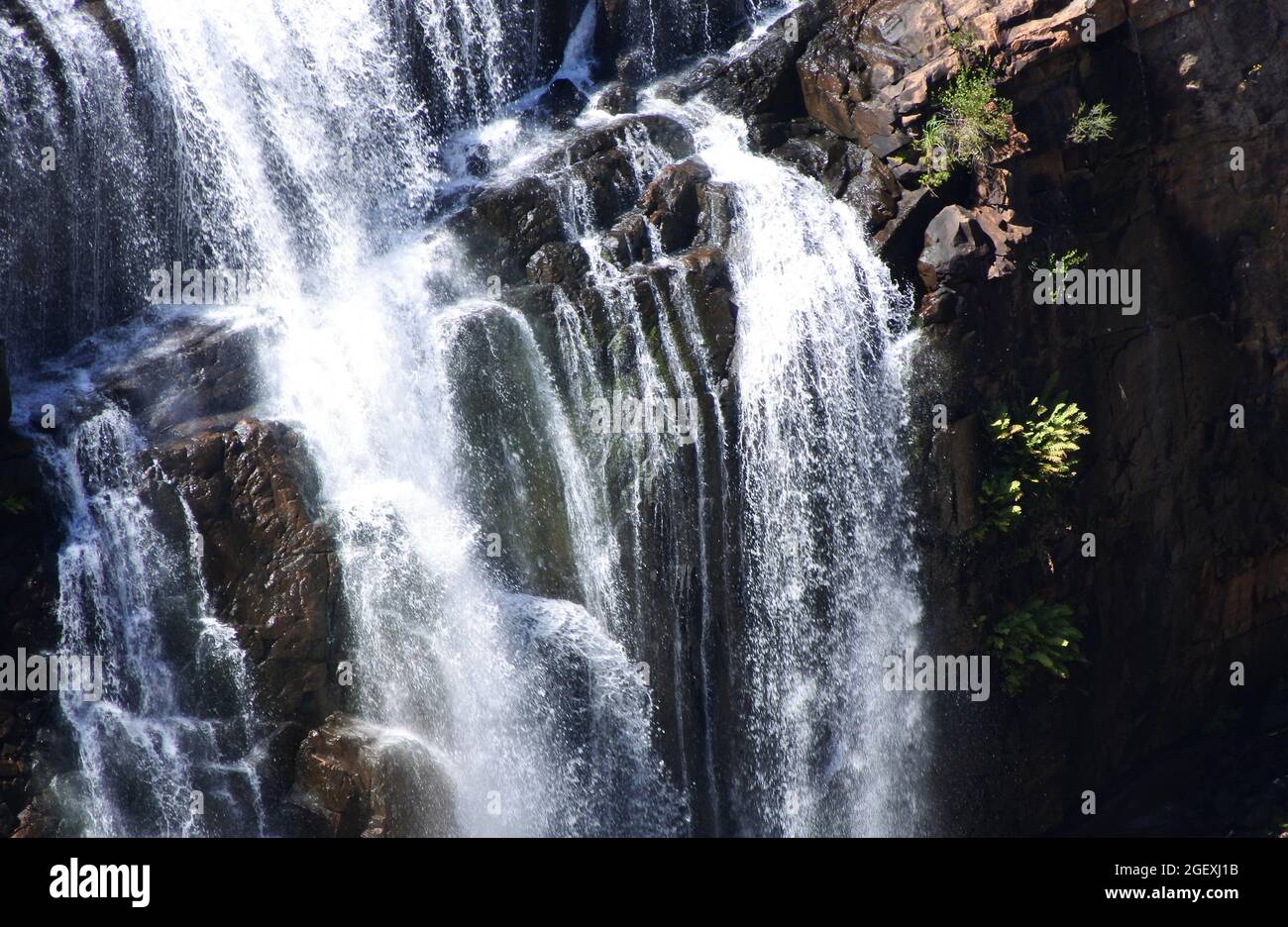 Waterfall flowing down rocks national hi-res stock photography and ...
