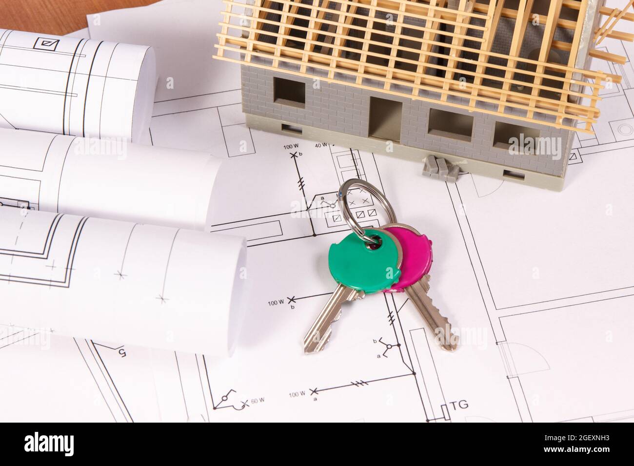 Home keys, house under construction and electrical diagrams for use in ...