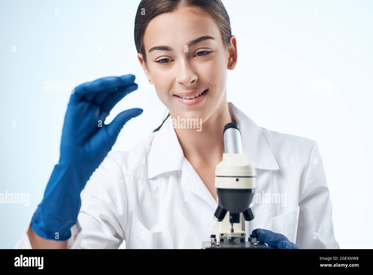 female laboratory assistant science research microscope biotechnology ...
