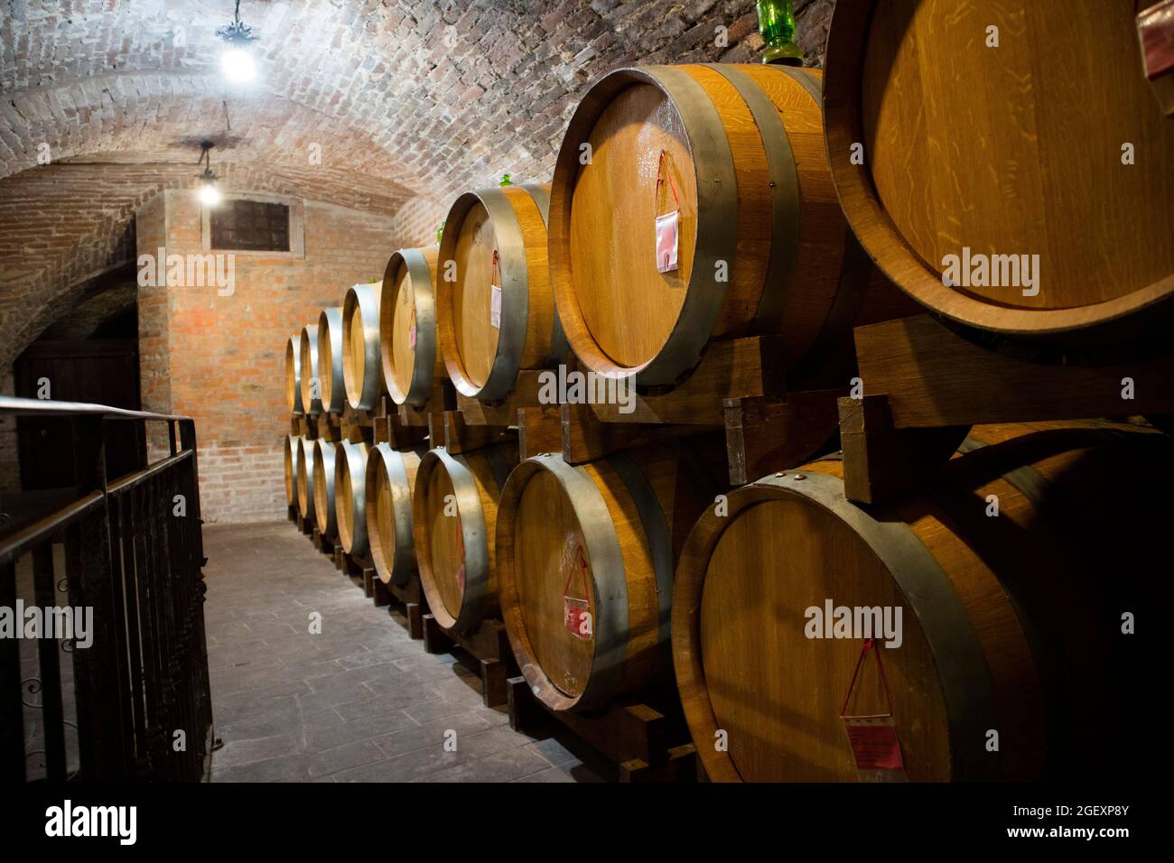 Ancient underground cellar with wooden barrels for the best ...