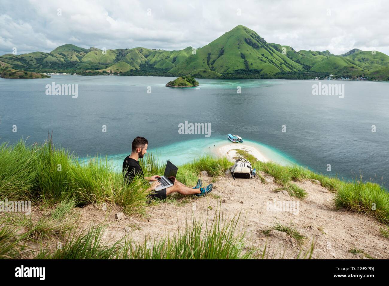 Tropical island working hi-res stock photography and images - Alamy