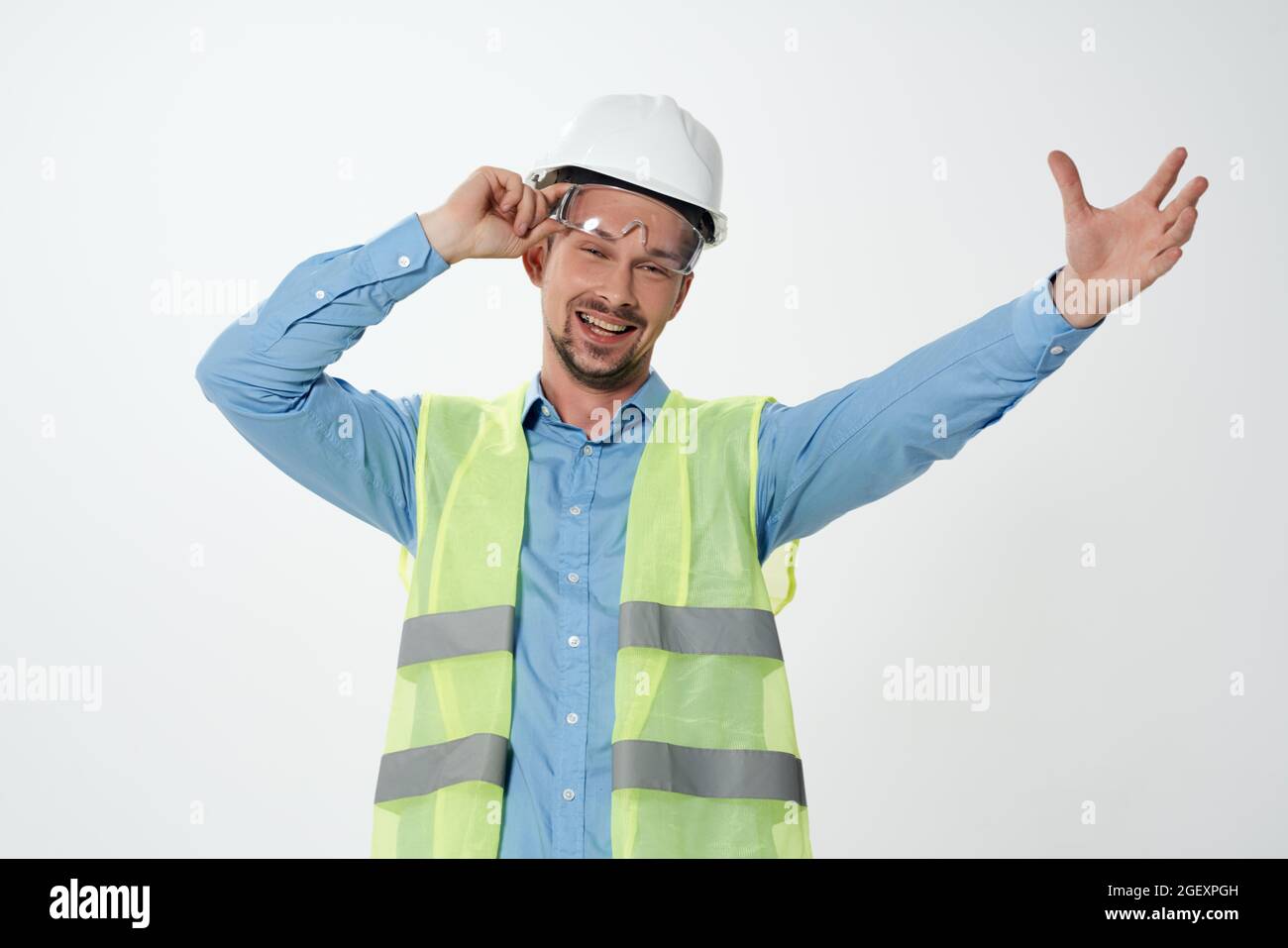man in white helmet Professional Job Working profession Stock Photo - Alamy