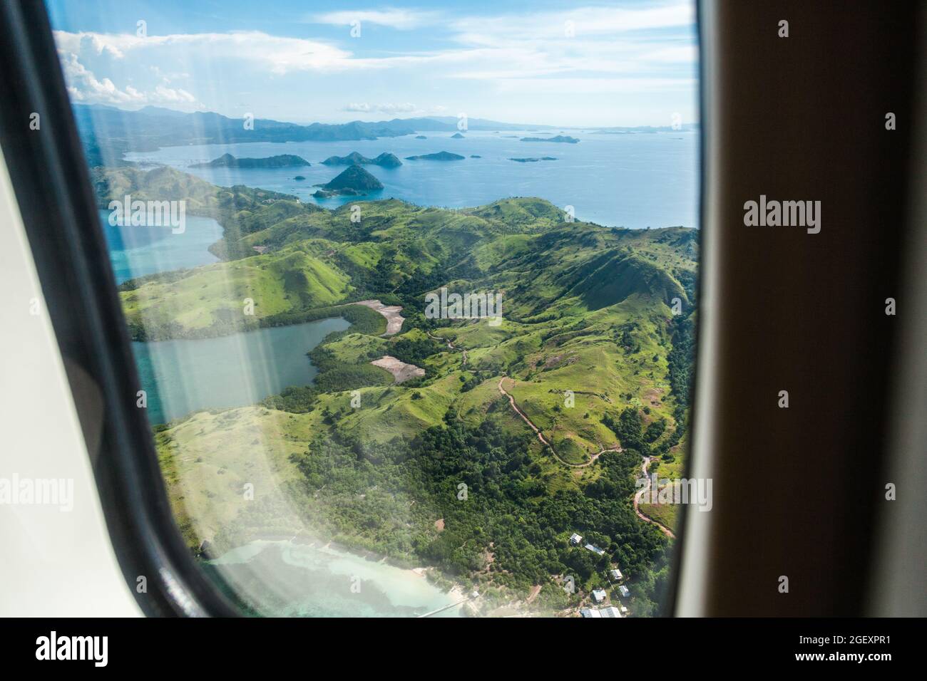 View of Komodo island from the airplane window Stock Photo - Alamy