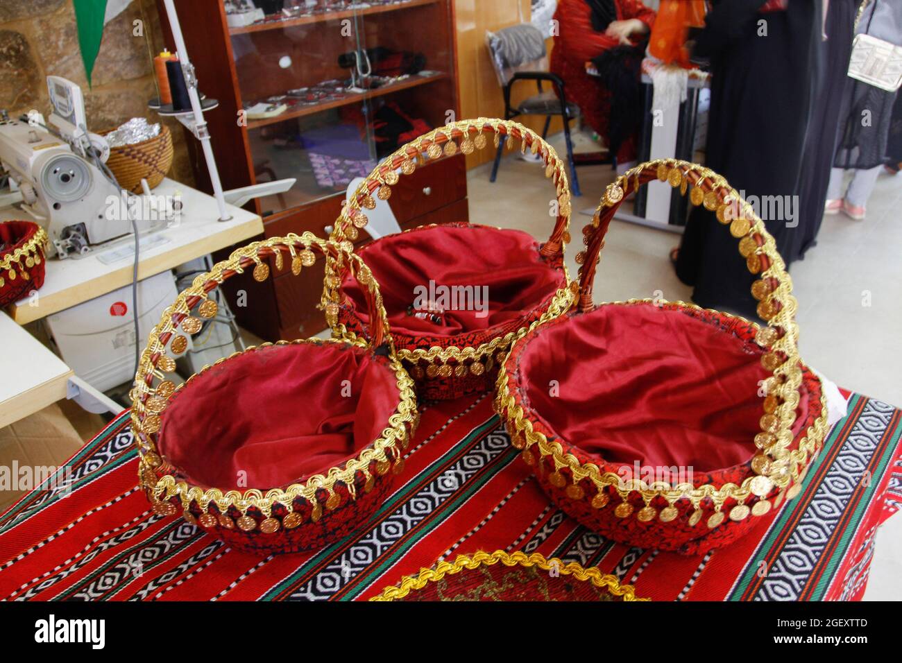 Handcrafted garments seen at an exhibition of Palestinian heritage on ...