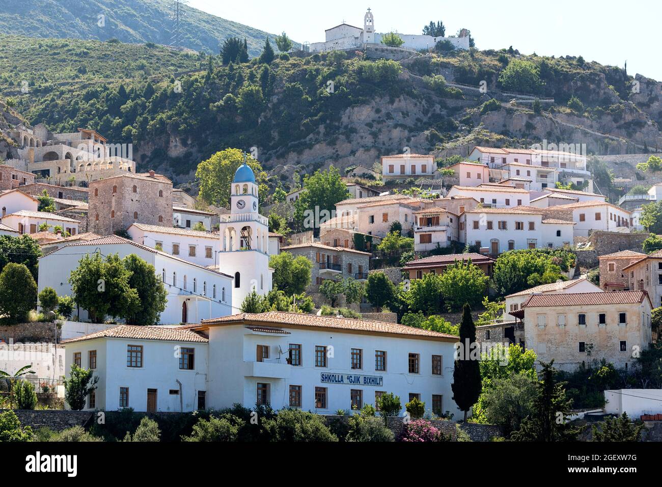 Church tower and the village of Dhermi (Dhermiu), Cikes massif ...